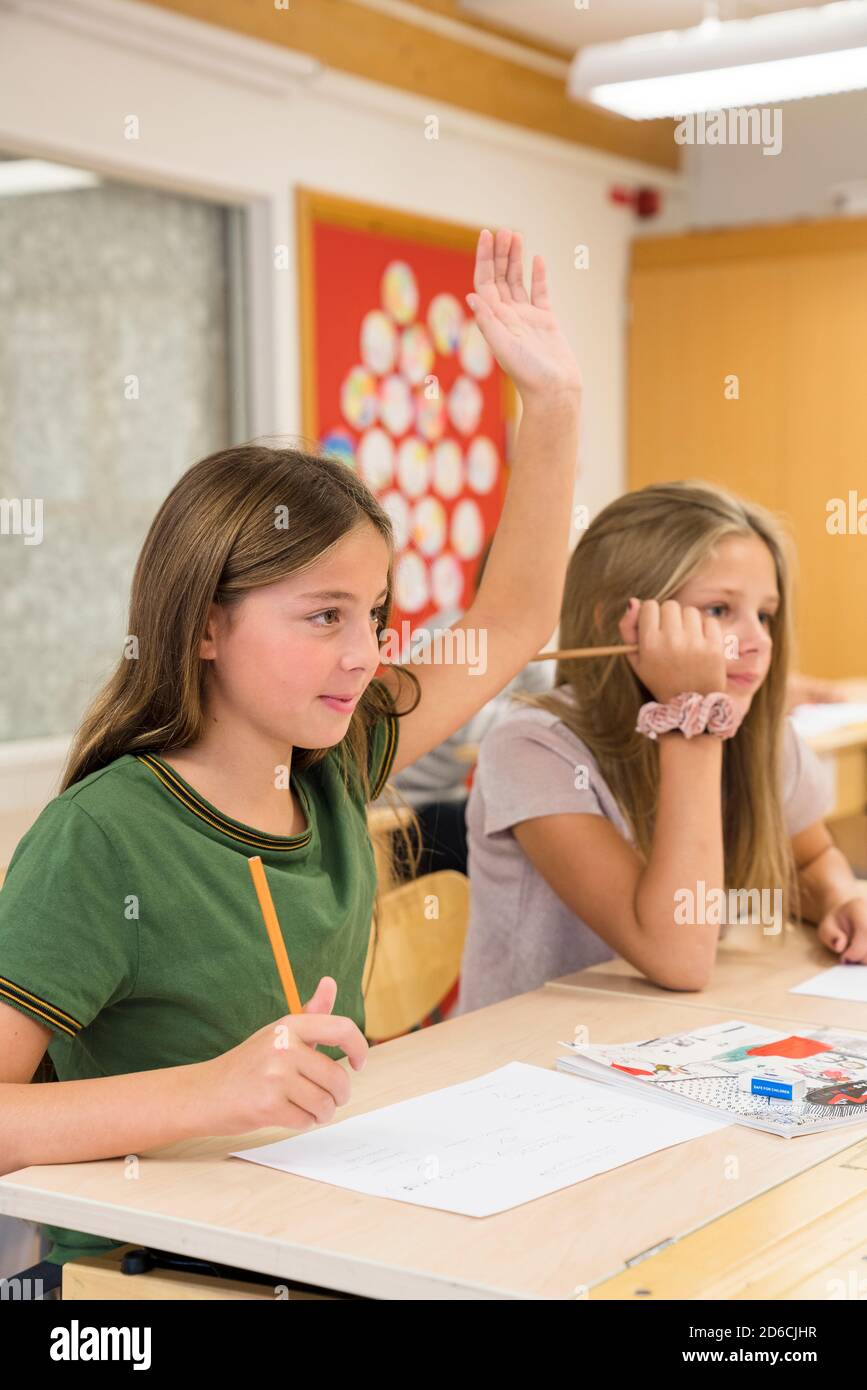 Girls in classroom Stock Photo - Alamy