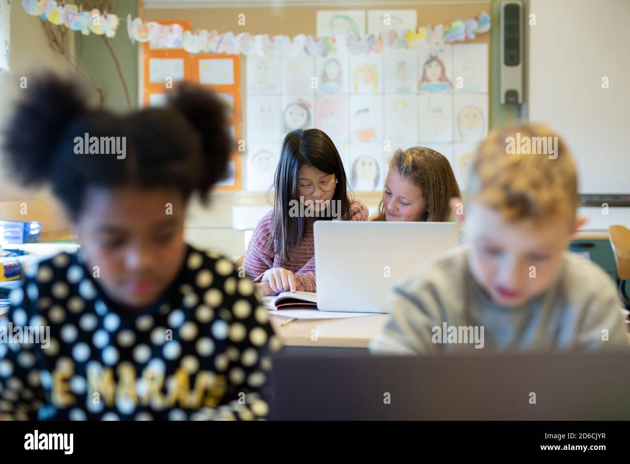 Girls in classroom Stock Photo - Alamy