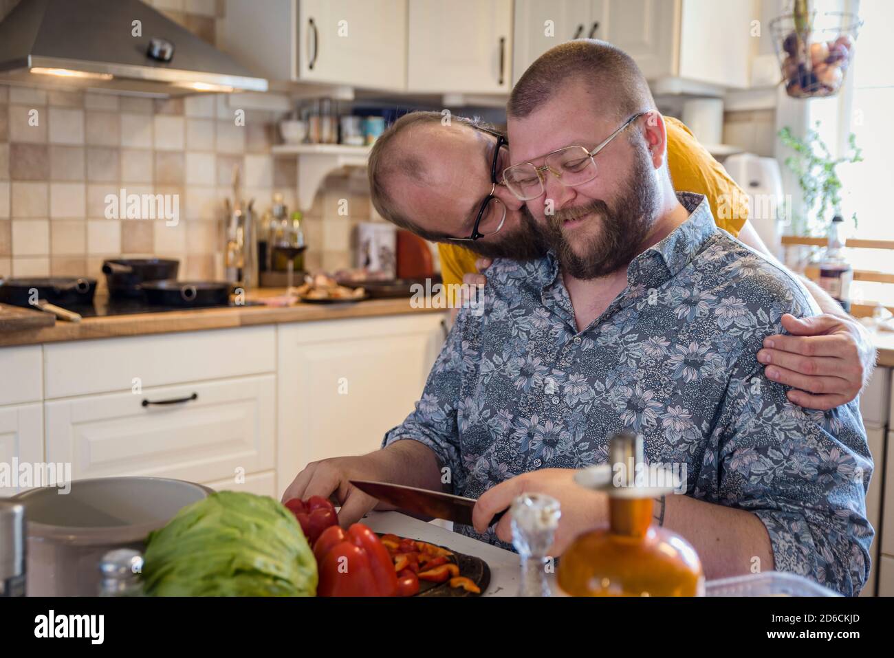 Men in kitchen preparing food Stock Photo - Alamy