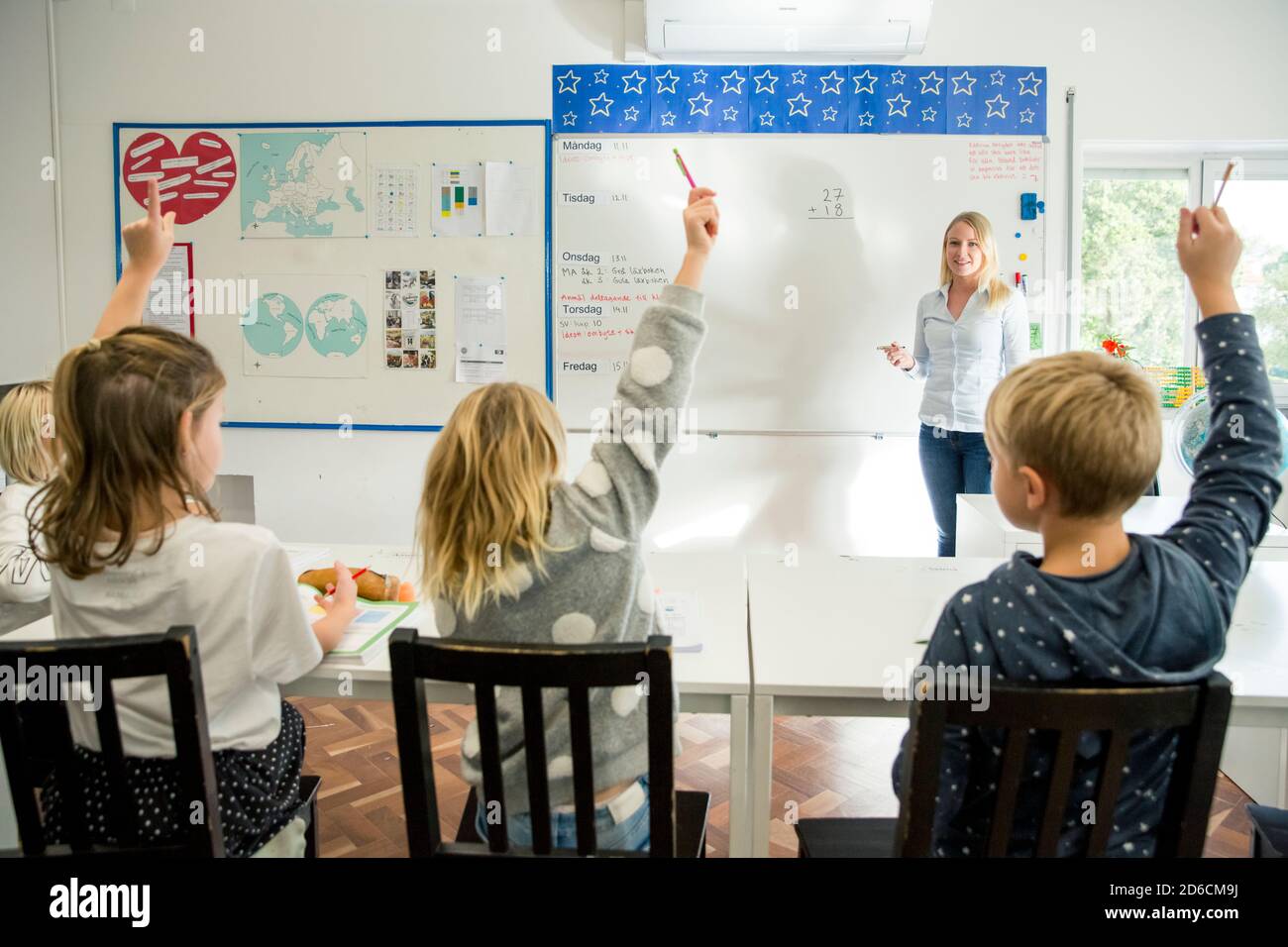 Children in classroom Stock Photo - Alamy