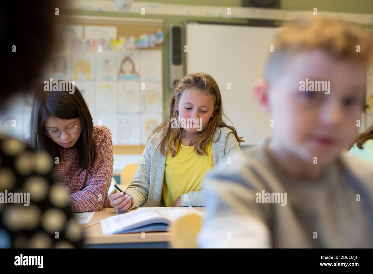 Girls in classroom Stock Photo - Alamy