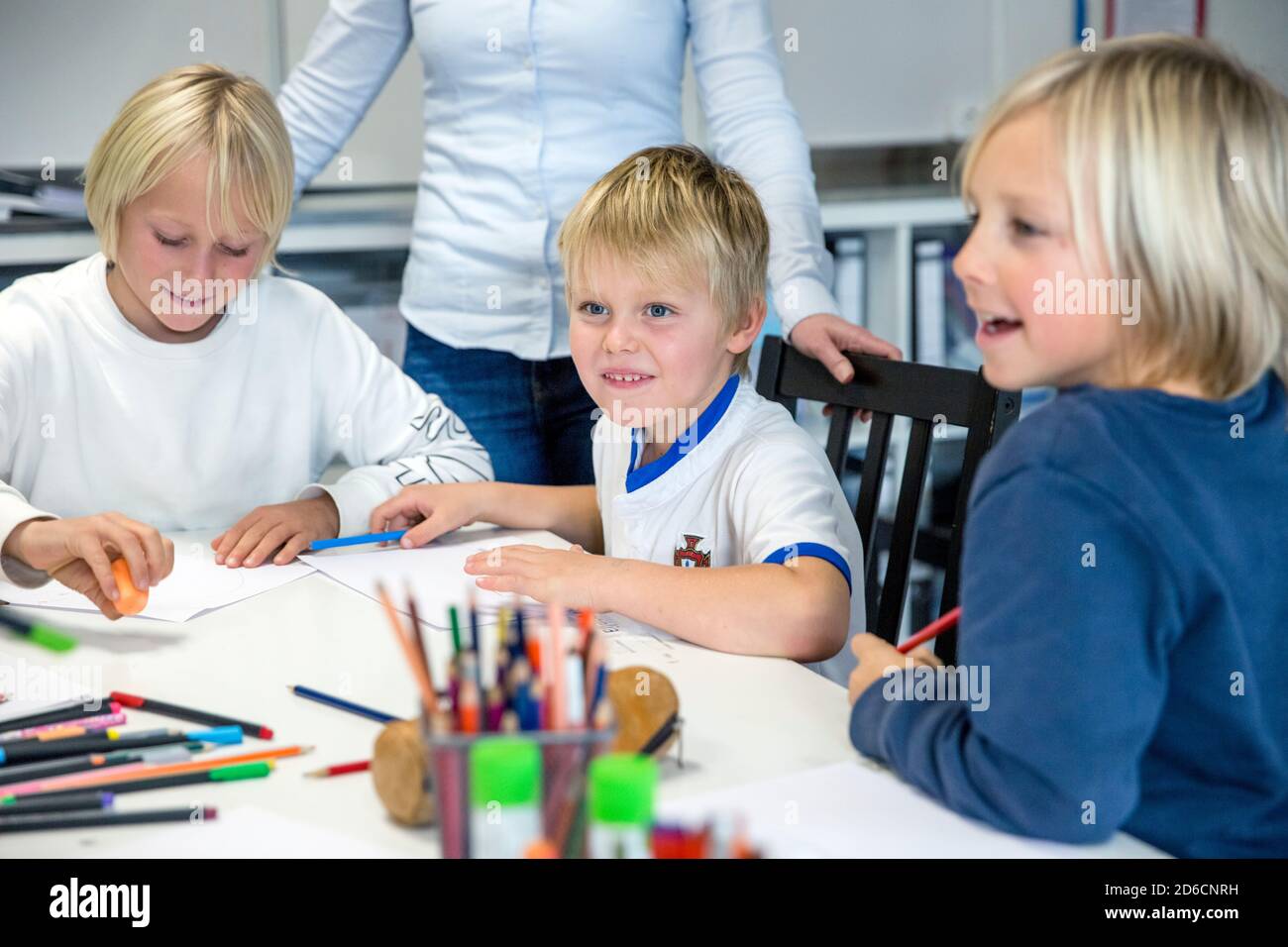 Boys in classroom Stock Photo - Alamy