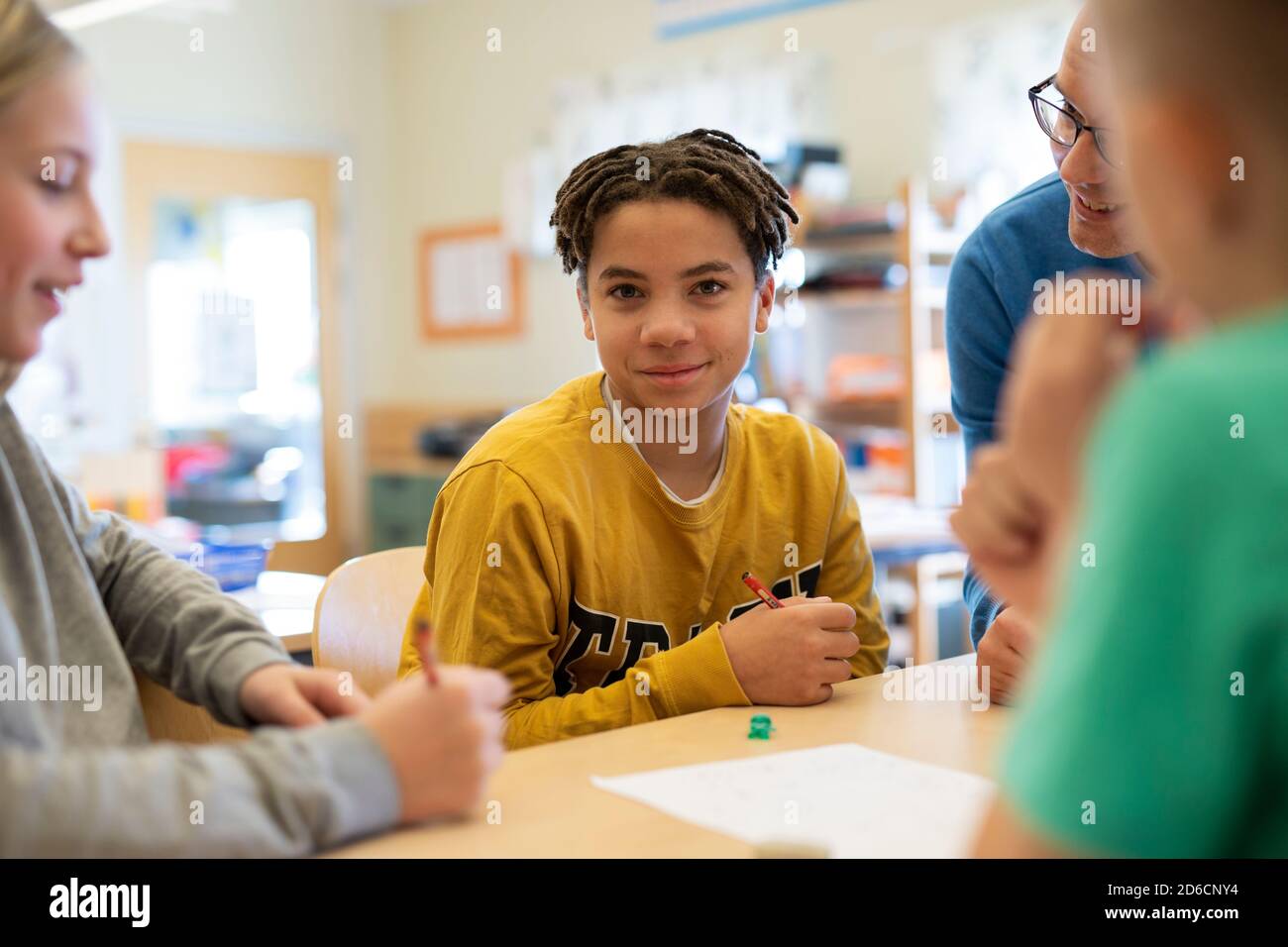 Boy in classroom Stock Photo - Alamy