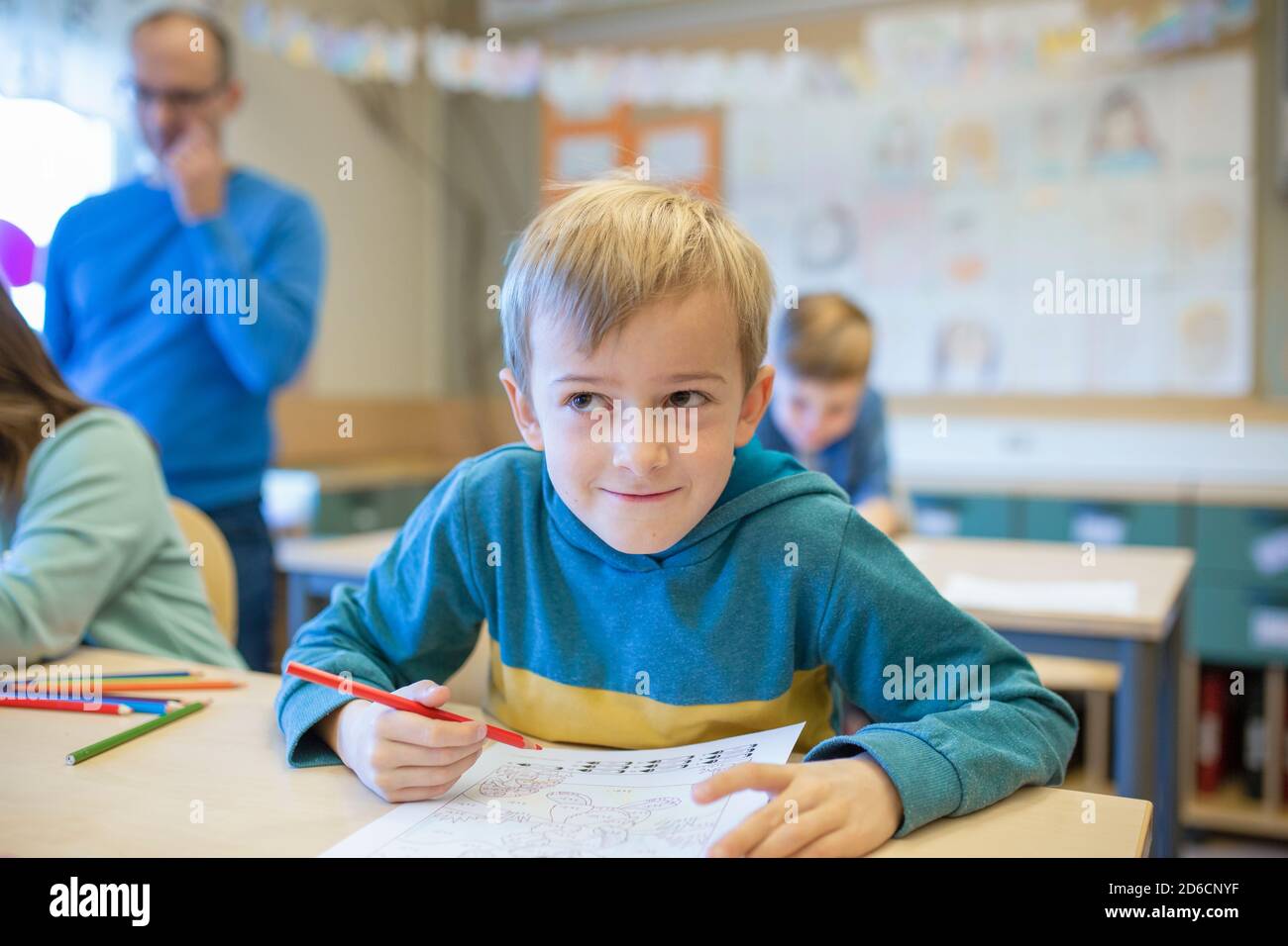 Boy in classroom Stock Photo - Alamy