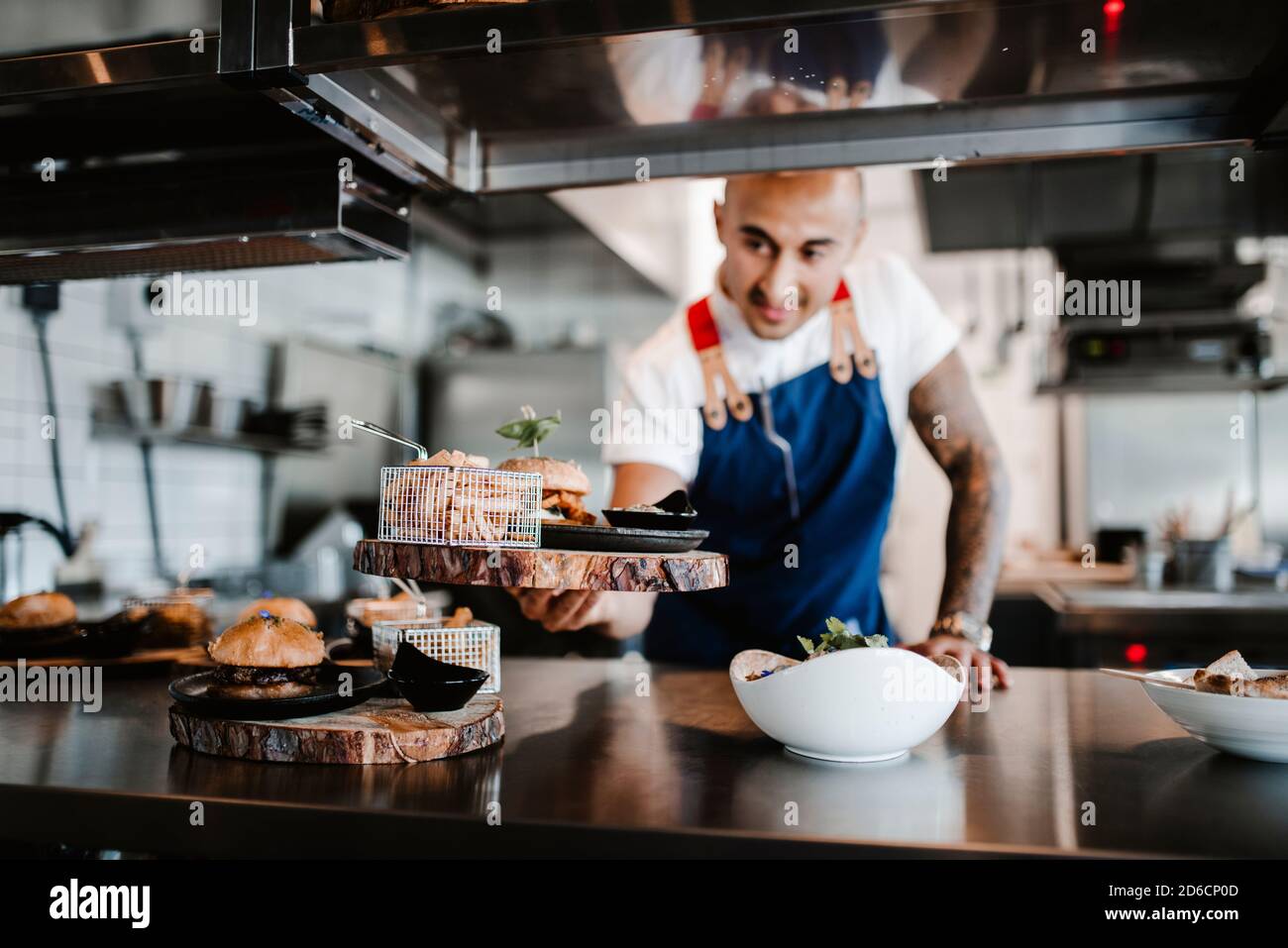 Chef working in kitchen Stock Photo - Alamy