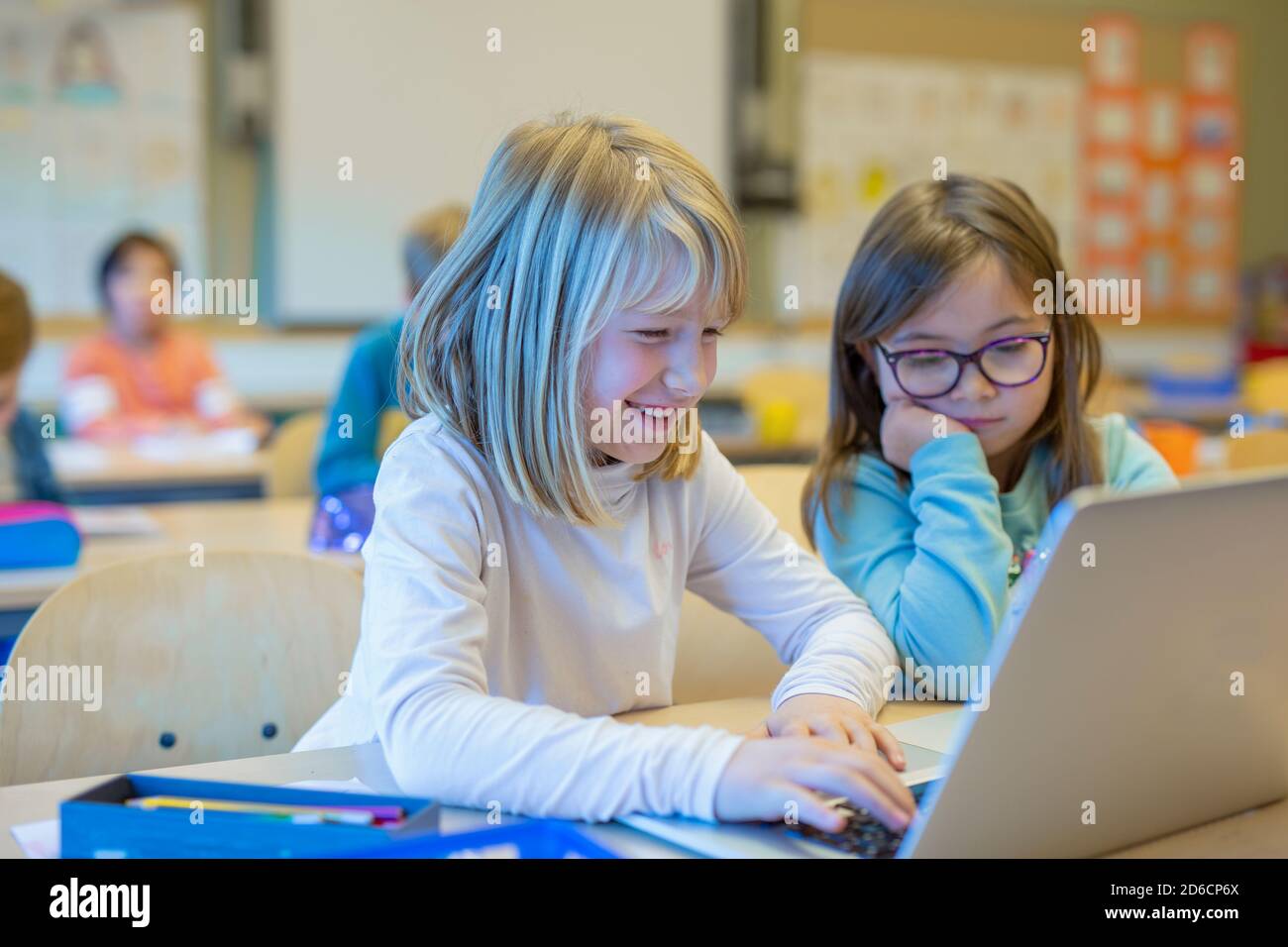 Children working on laptop classroom hi-res stock photography and ...