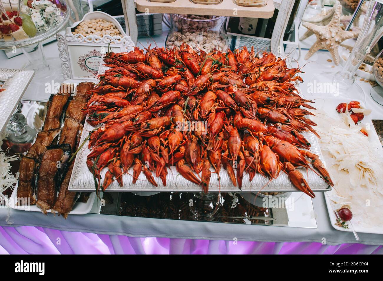 Large square plate of delicious crayfish and lobsters with on the ...