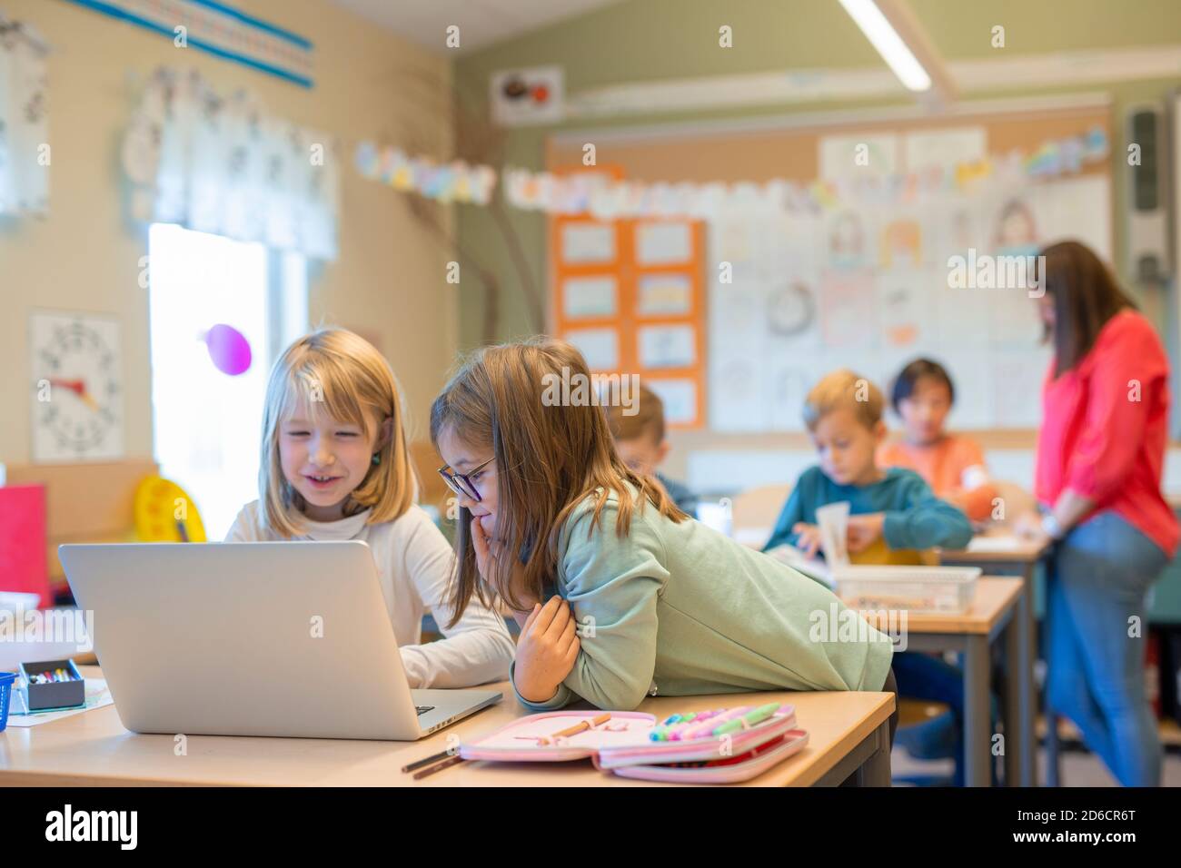 Girls in classroom Stock Photo - Alamy