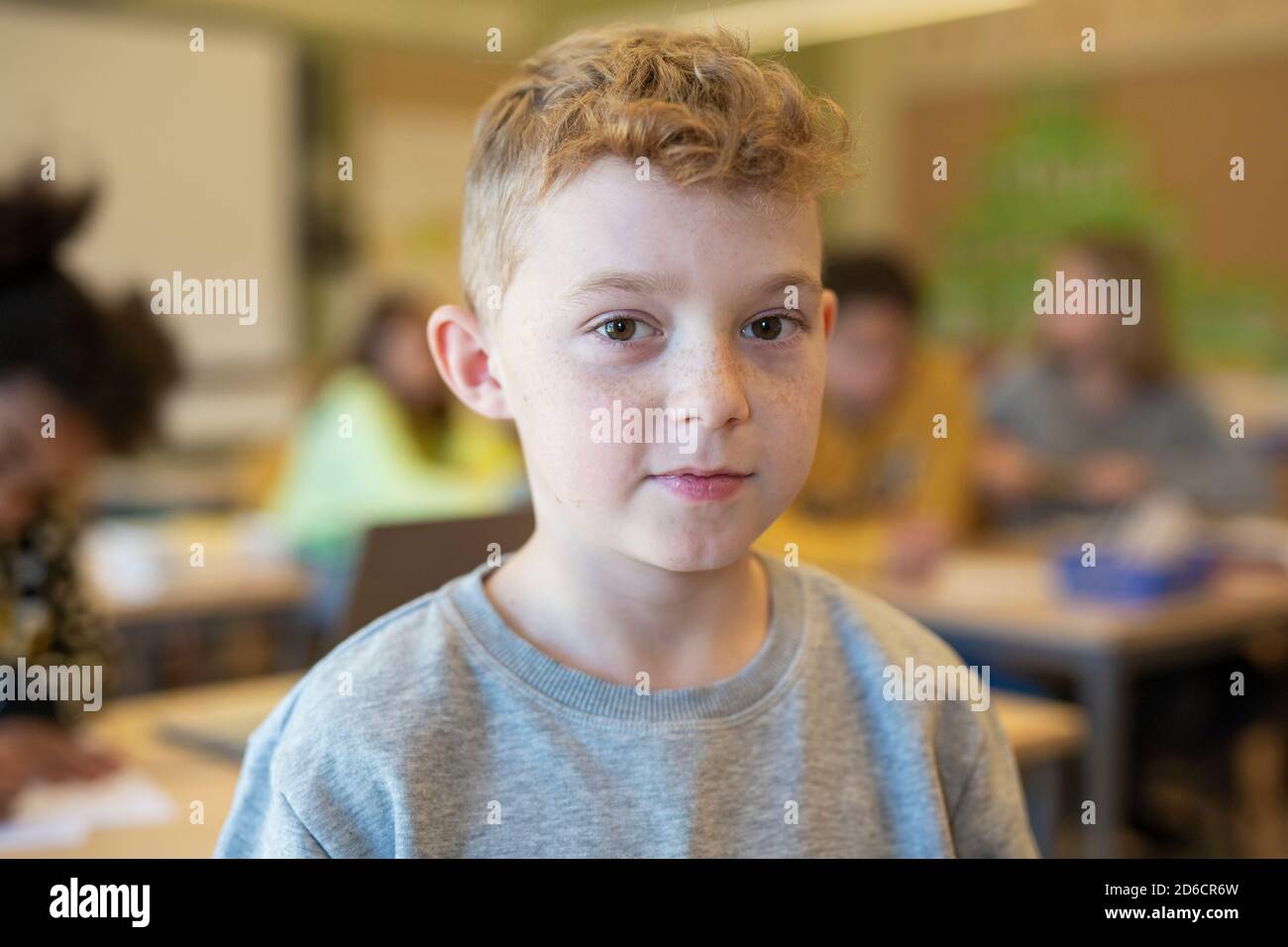 Boy in classroom Stock Photo - Alamy