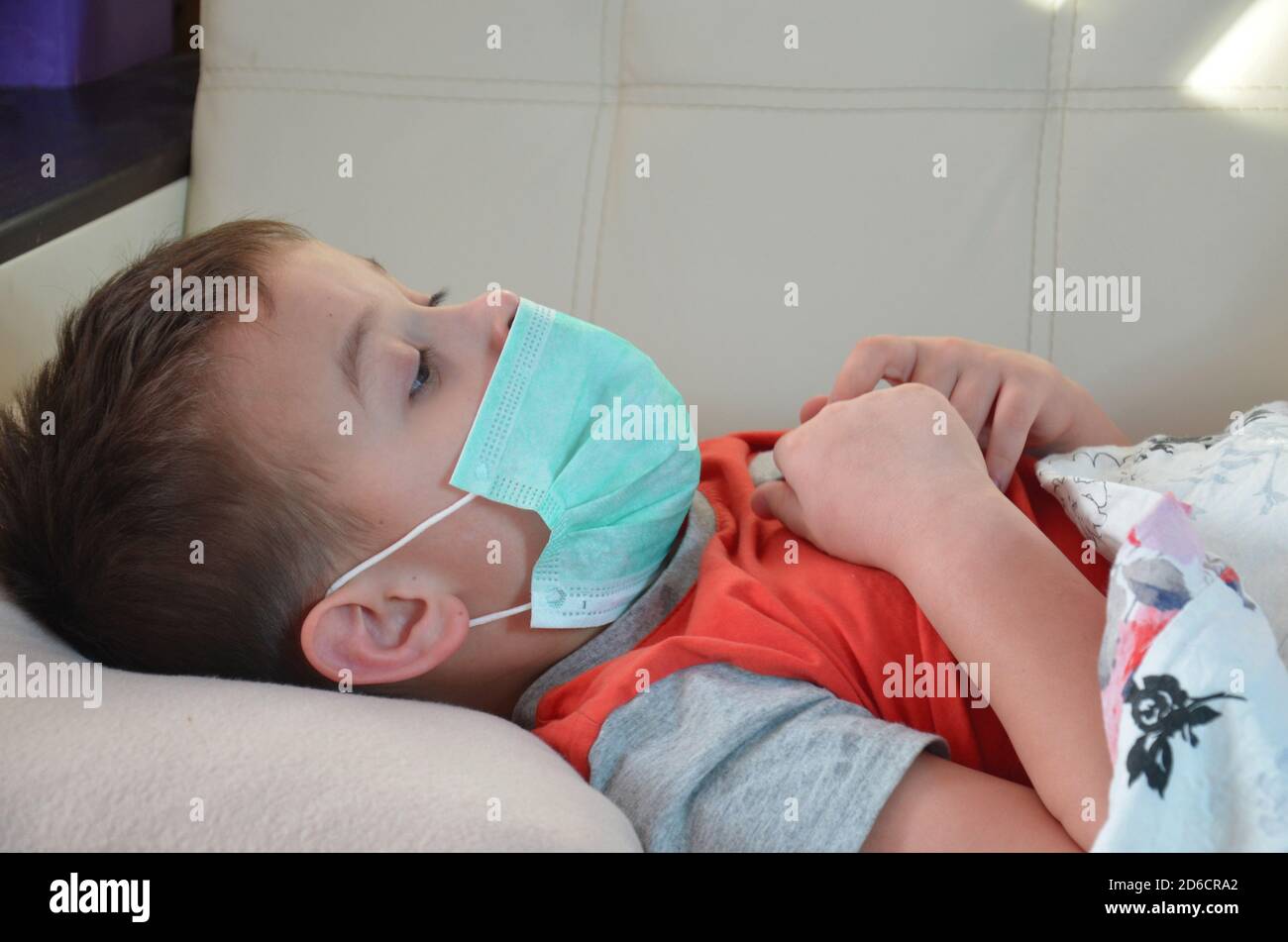 Sick Teenager with Thermometer in the Bed. fever, virus. waiting for a ...