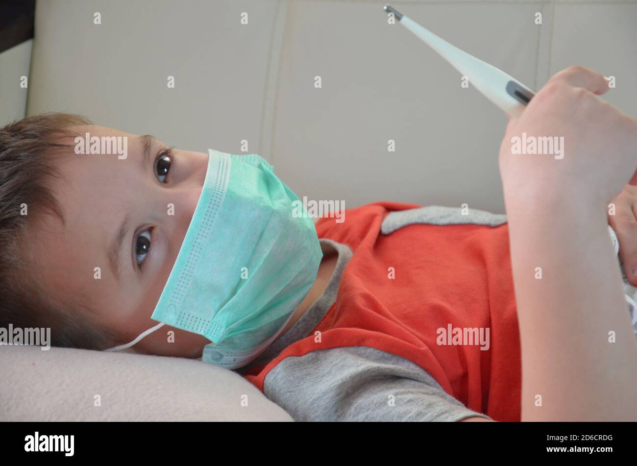 Teenager fever thermometer hi-res stock photography and images - Alamy