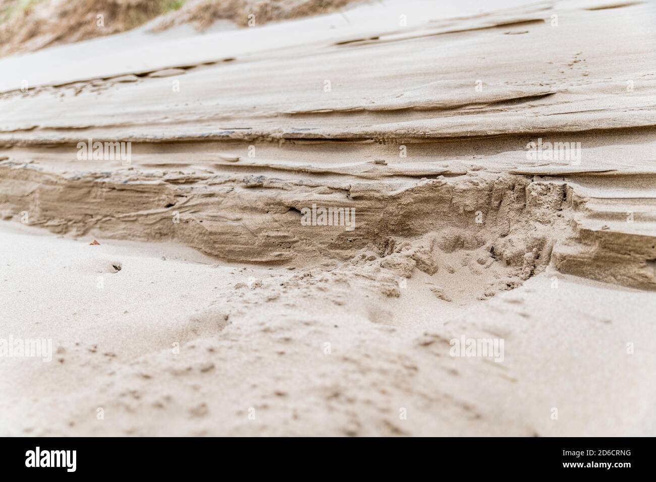 Striated sand on a beach Stock Photo - Alamy