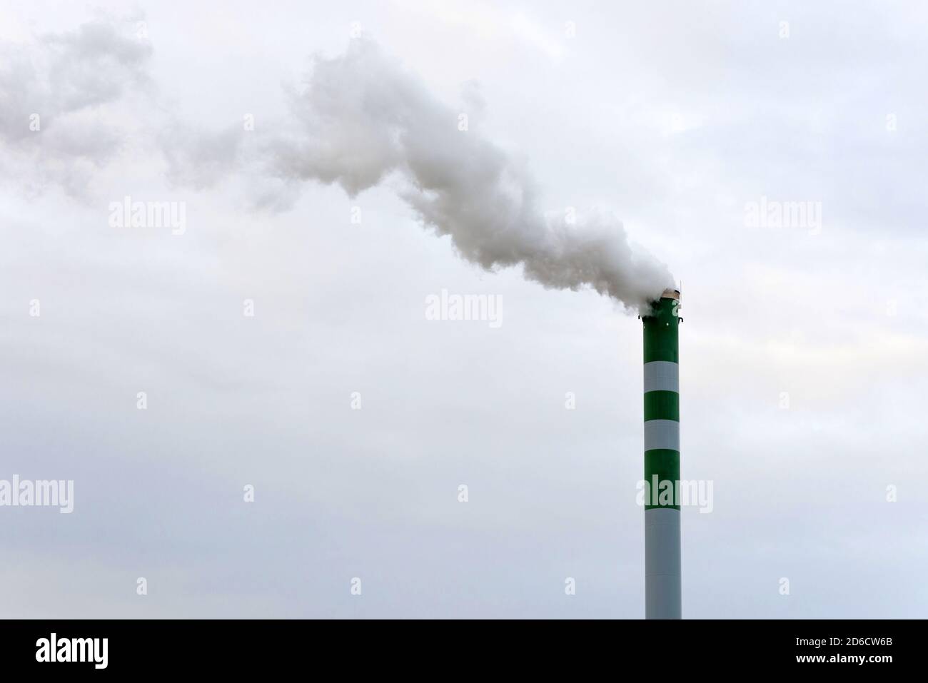 Stock Photo Big industrial green and white pipe with smoke going ...