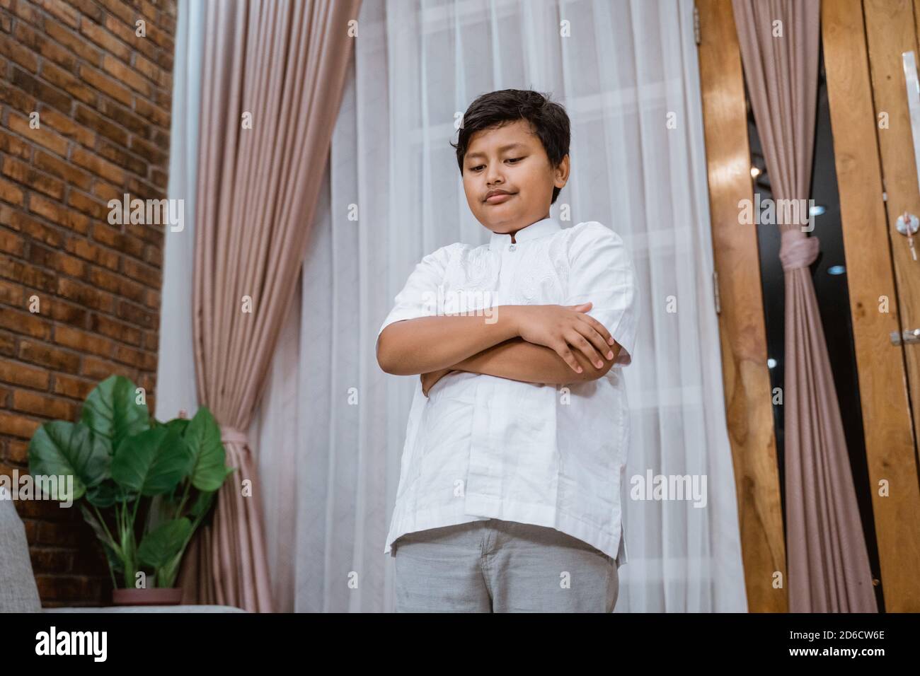 Muslim boys pray alone indoors while staying at home Stock Photo - Alamy