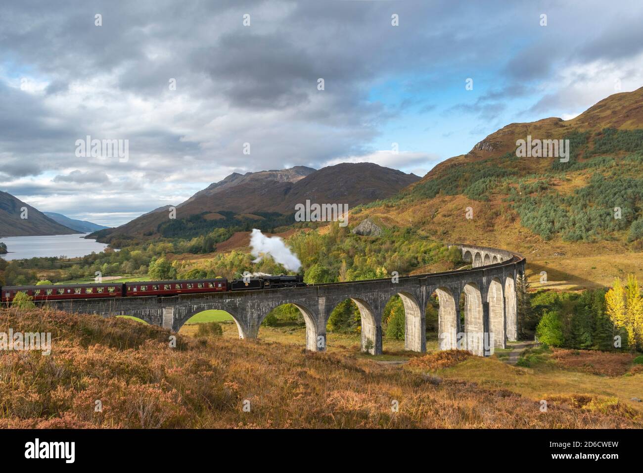 FORT WILLIAM SCOTLAND THE JACOBITE STEAM TRAIN ENTERING THE GLENFINNAN ...