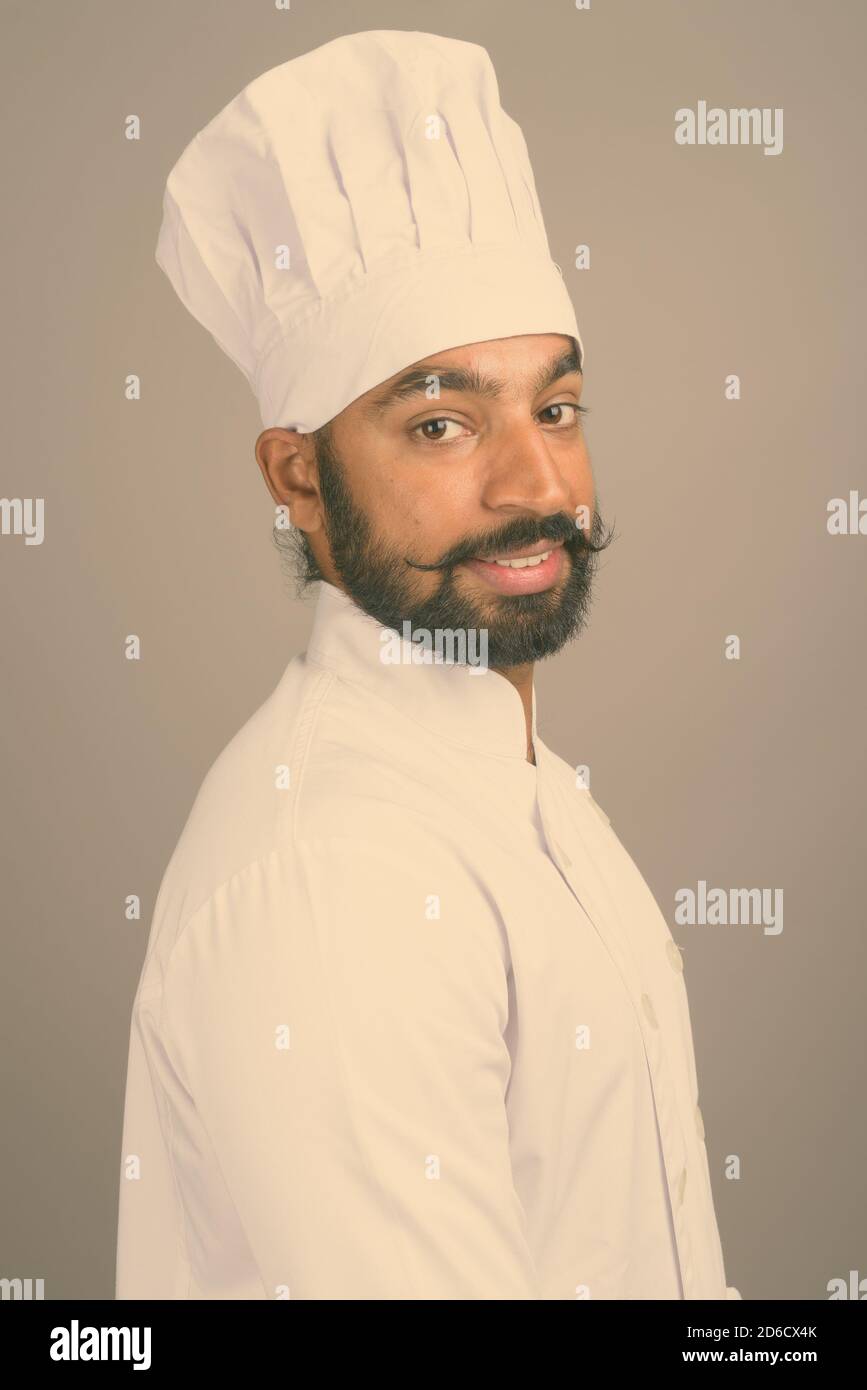 Closeup smiling male chef hi-res stock photography and images - Alamy
