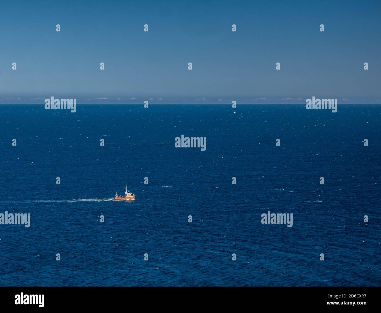 Fishing trawler heading out to sea hi-res stock photography and images ...