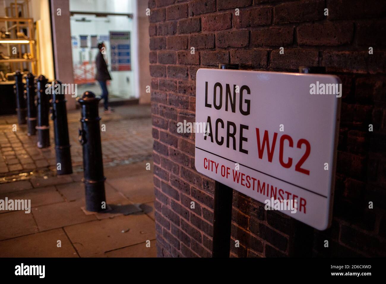 A City of Westminster street sign saying Long Acre on the corner of ...