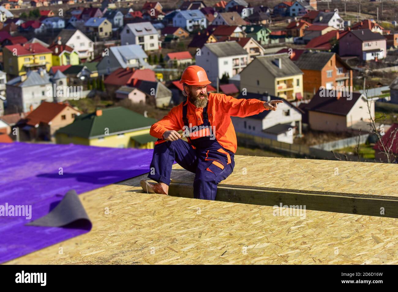 Building skills. roofer wear safety uniform inspection. Roofer working ...