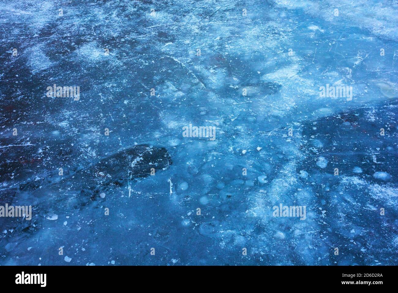 Ice Background on a Lake in Winter with Snow Stock Photo - Alamy