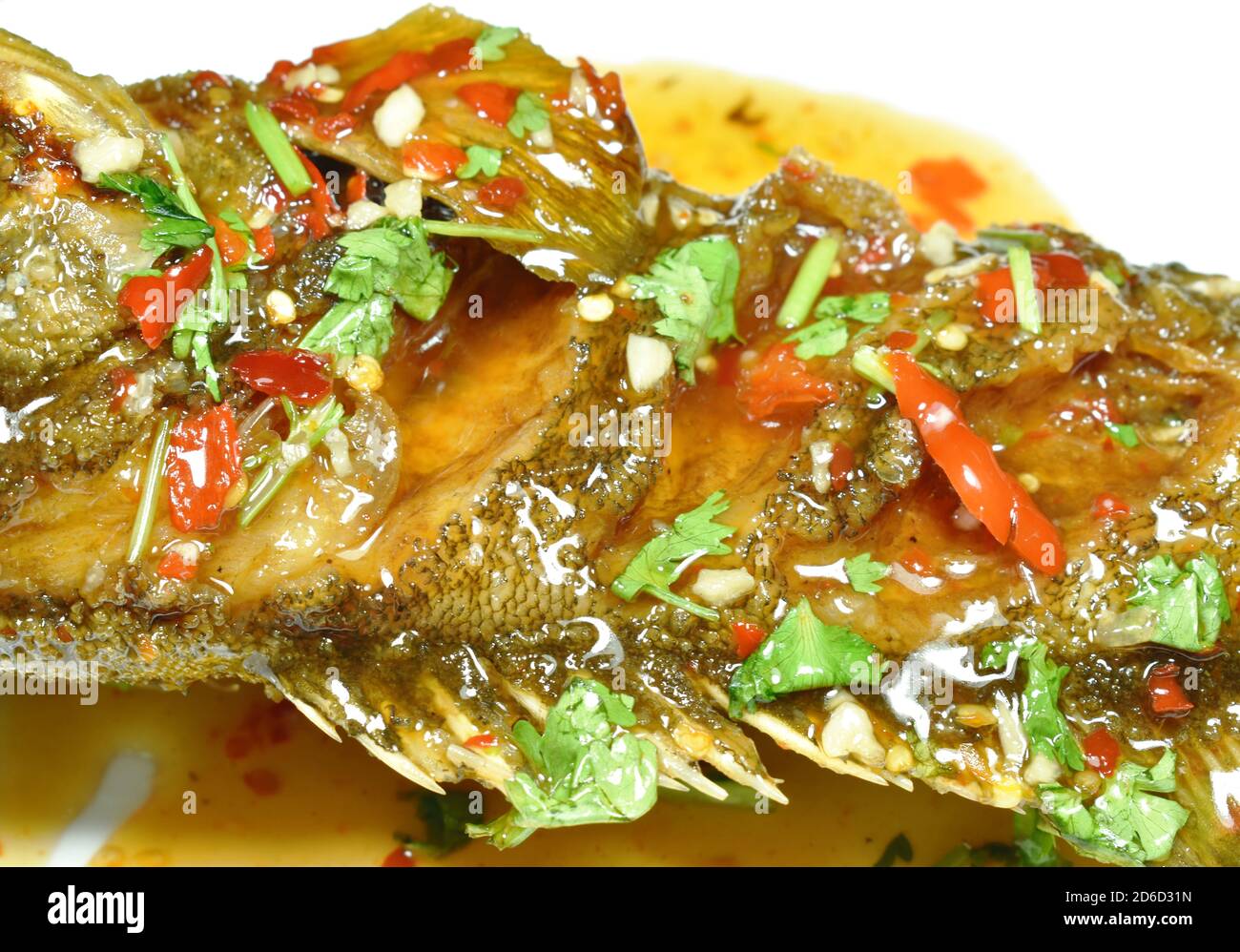 deep fried red banded grouper fish dressing sweet chili sauce on plate ...