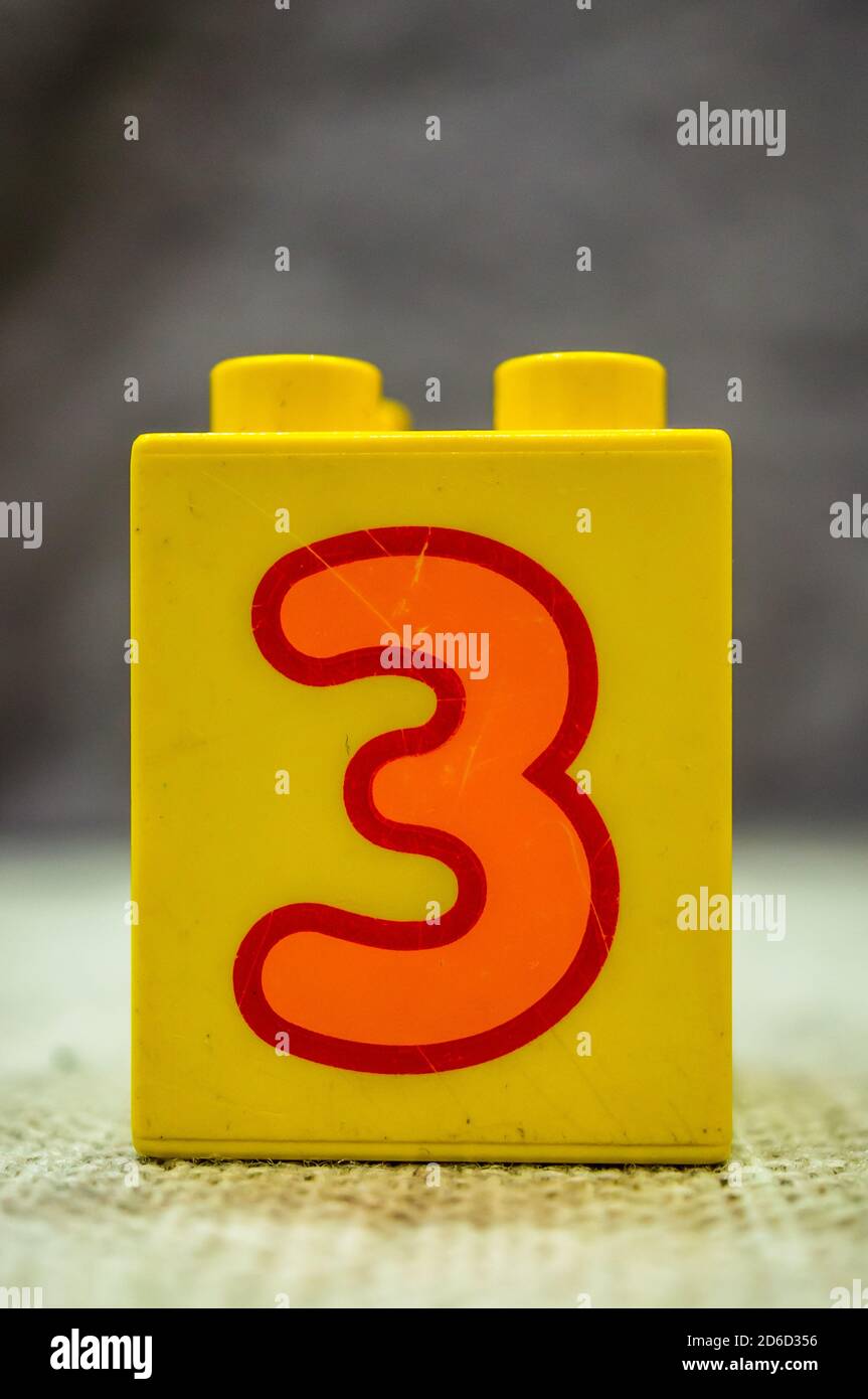 POZNAN, POLAND - Oct 14, 2020: Plastic yellow Lego Duplo toy block with ...