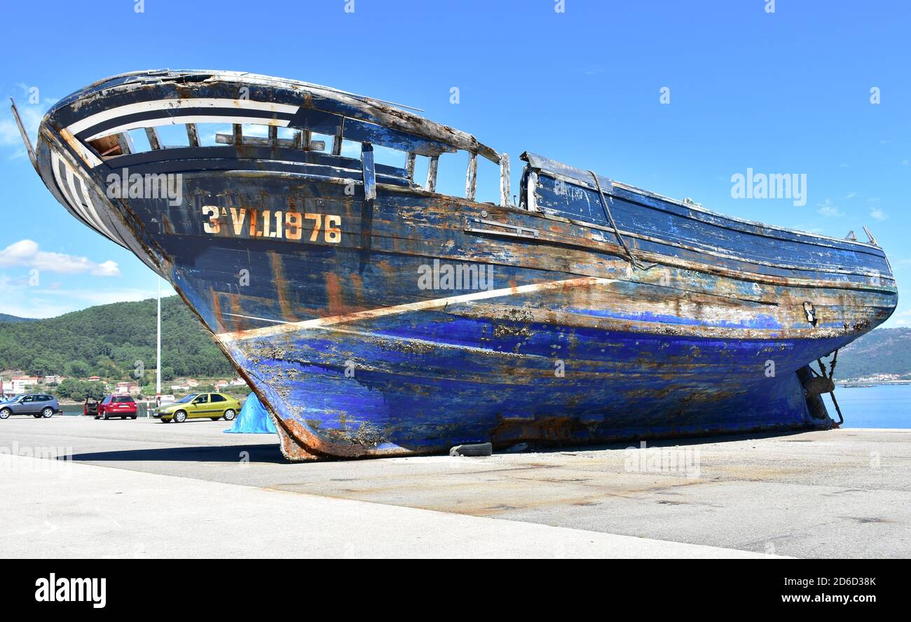 Muros, Spain, Aug 23, 2020. Old blue ruined wooden galician fishing ...