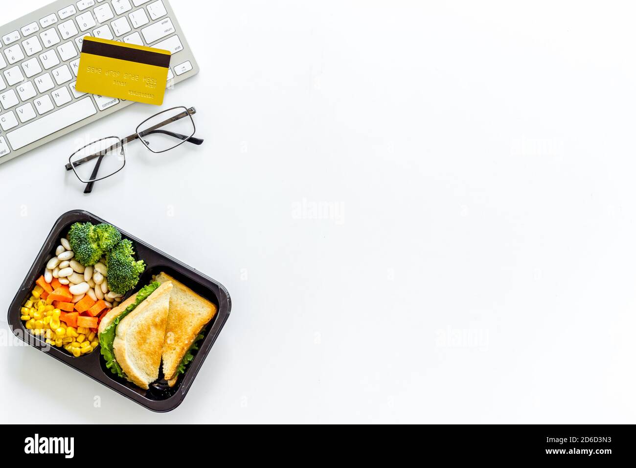 Call for delivery concept. Lunch boxes with meal on working place Stock ...