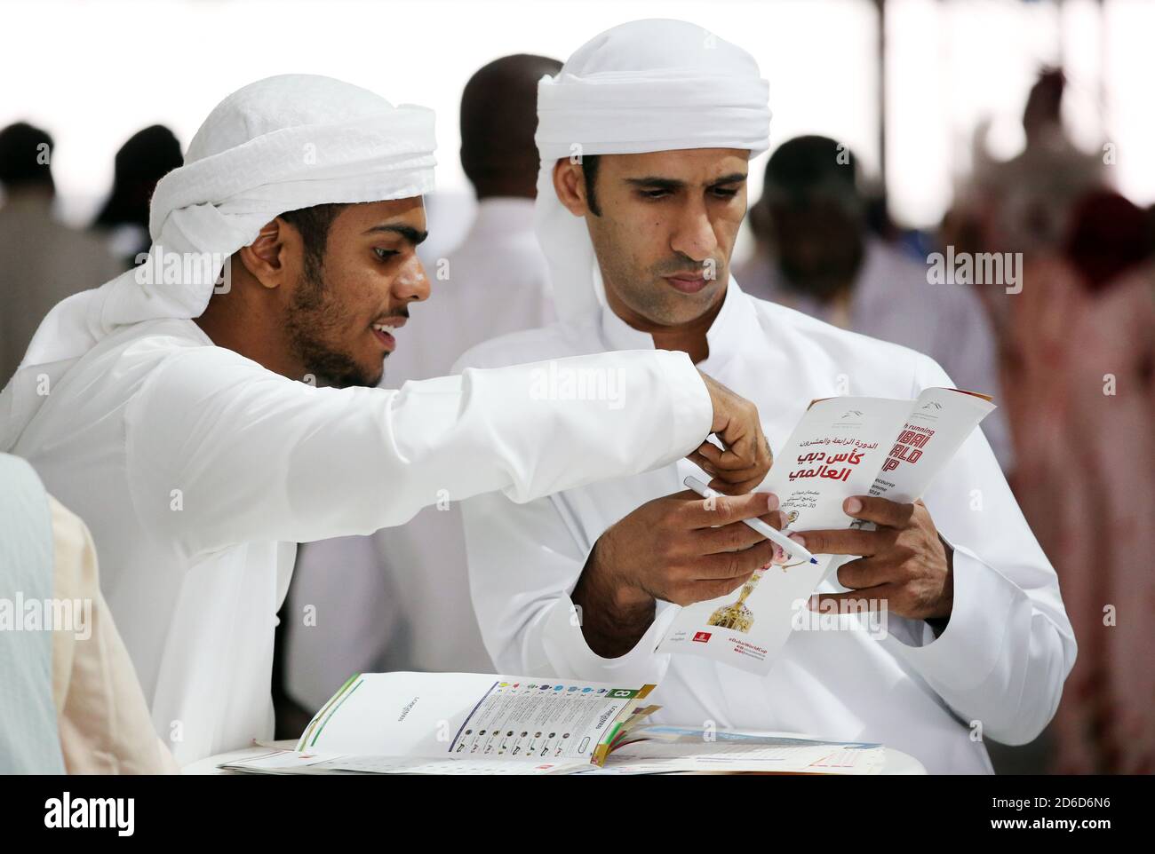 30.03.2019, Dubai, , United Arab Emirates - local men betting at the ...