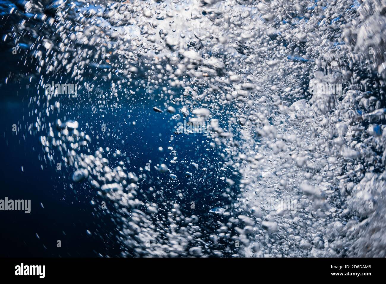 Underwater bubbles texture in blue ocean. Air bubbles in tropical sea ...