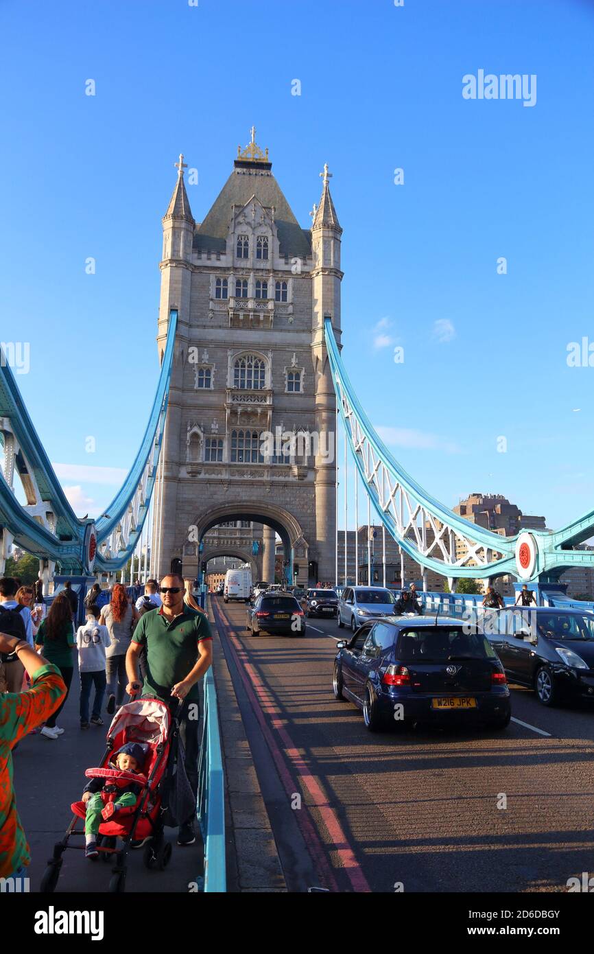 LONDON, UK - JULY 8, 2016: People walk across the Tower Bridge in ...