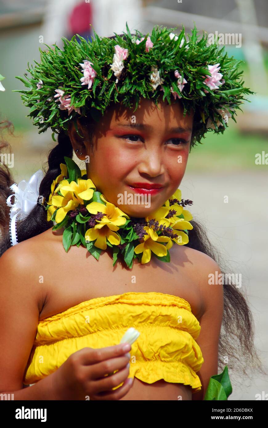 Young Polynesian girl greeter on Hanavave Stock Photo - Alamy