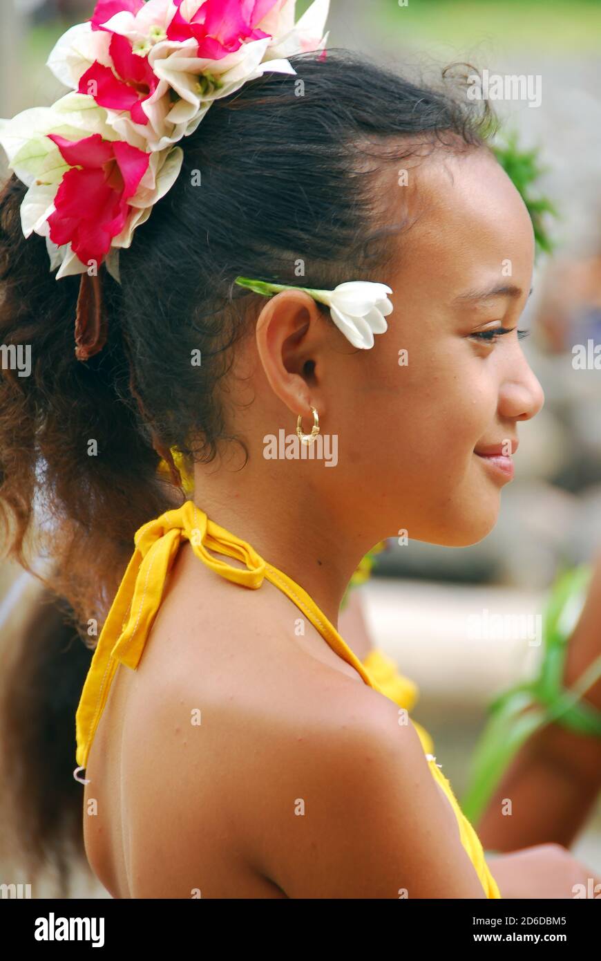 Young Polynesian girl greeter on Hanavave Stock Photo - Alamy