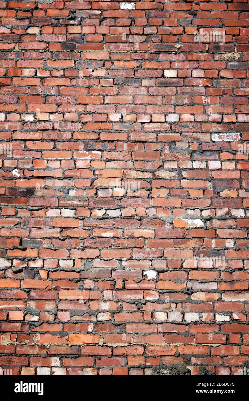 Red aged brick wall texture. Building background Stock Photo - Alamy