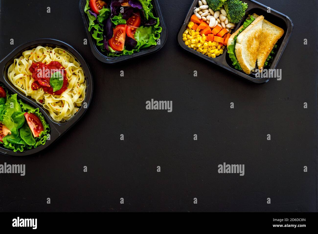 Lunch boxes with meal. Food delivery concept. Overhead view Stock Photo ...