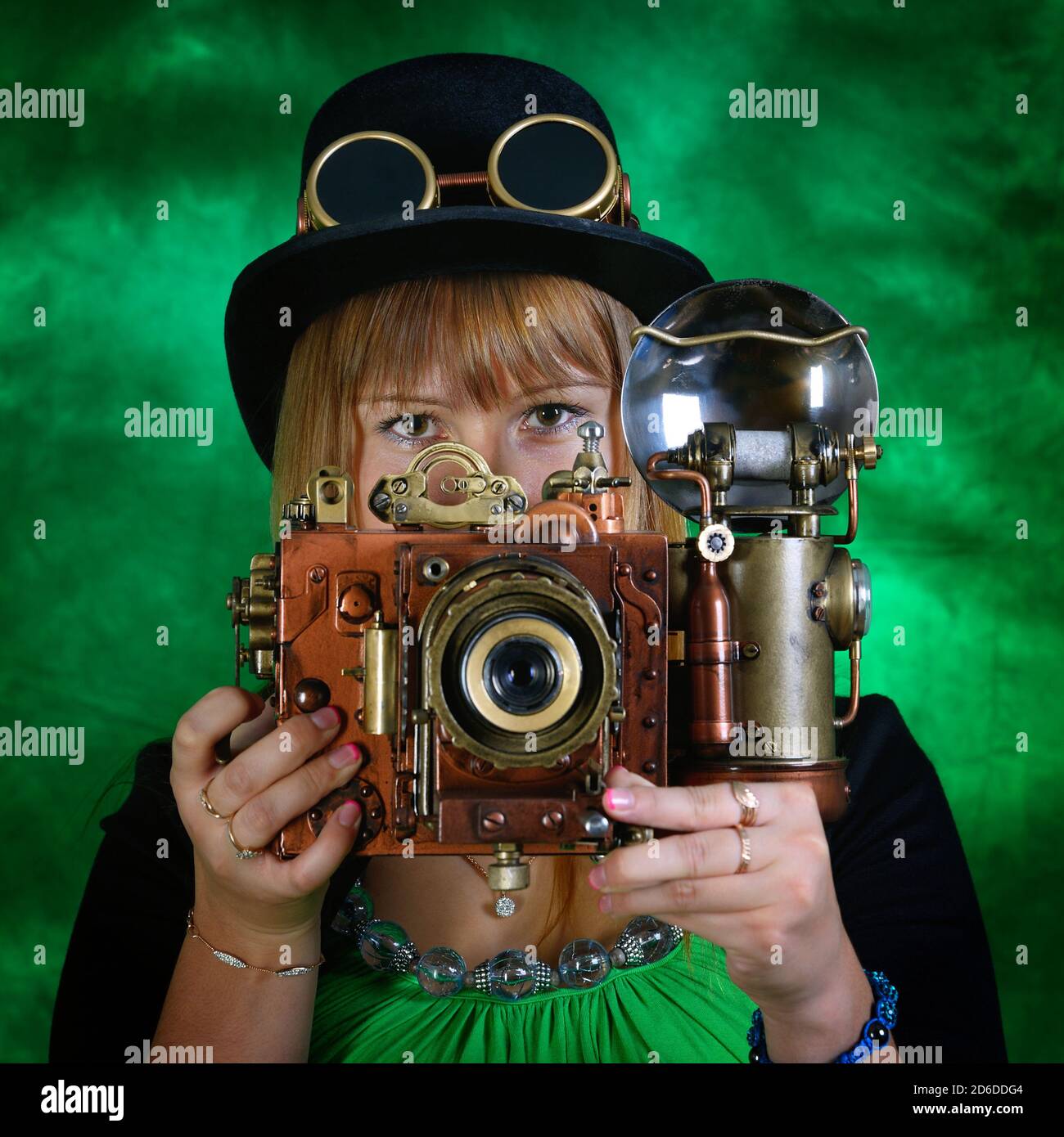 Portrait of a steam punk girl with a camera Stock Photo - Alamy