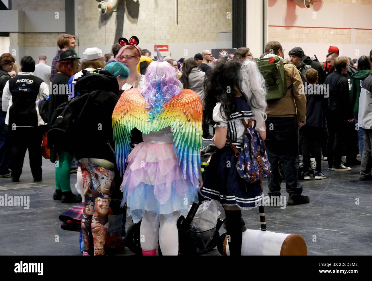 Cosplayers await to get into the MCM Comic Con held at the NEC ...