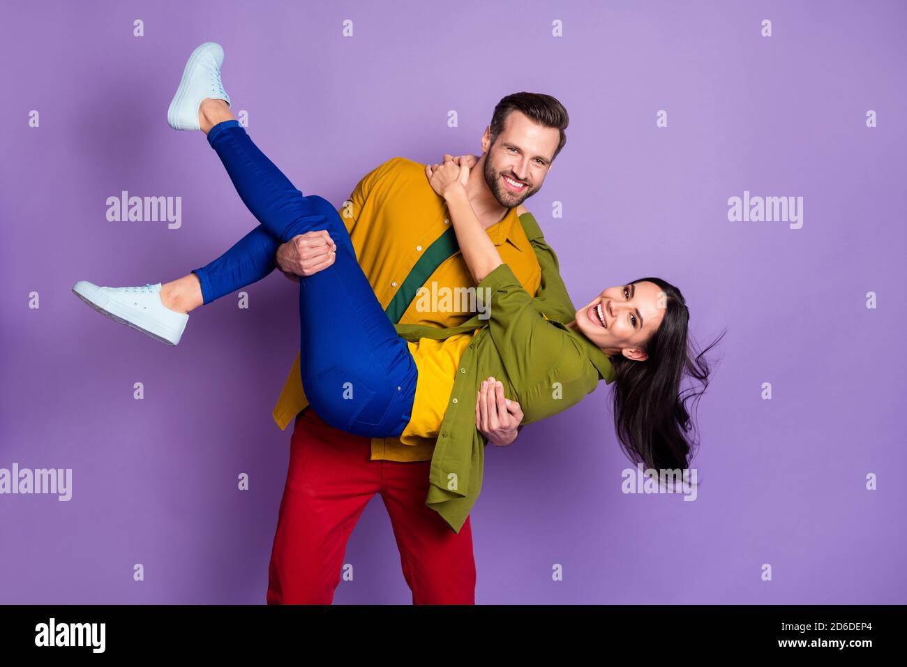 Photo charming lady handsome fiance guy couple carry wife bride hold ...