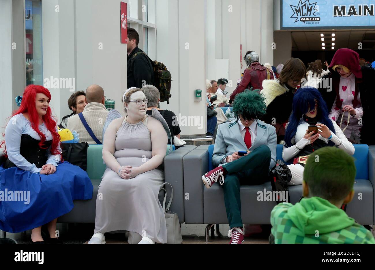 Cosplayers take a break during the MCM Comic Con held at the NEC ...