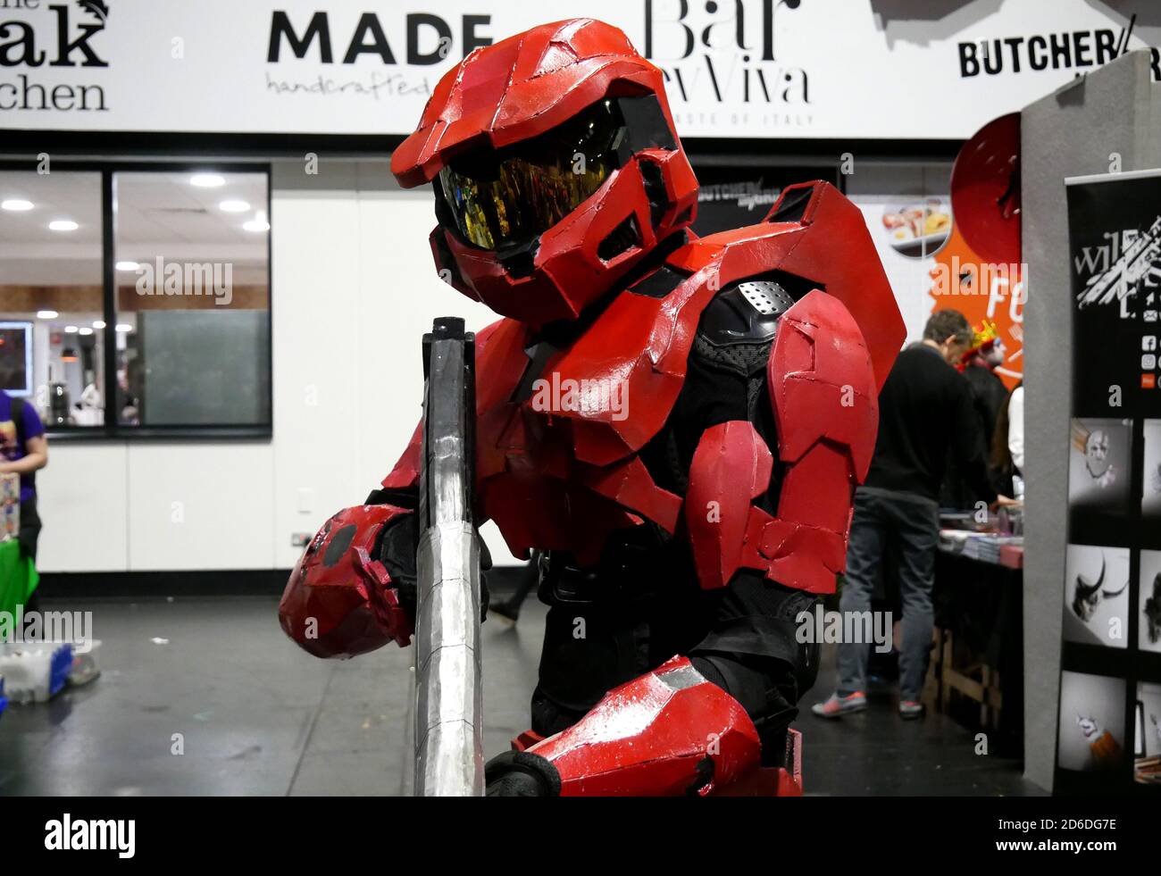 A cosplayer dressed as Master Chief from the video game Halo during the ...