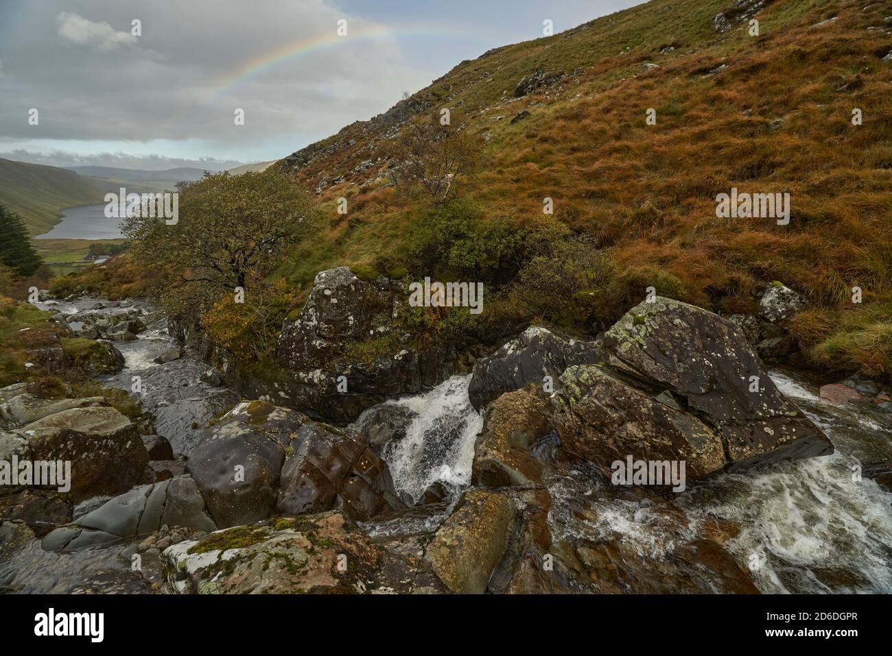 Vivid rainbow over waterfalls and Talla Reservoir in Autumn, Scottish ...