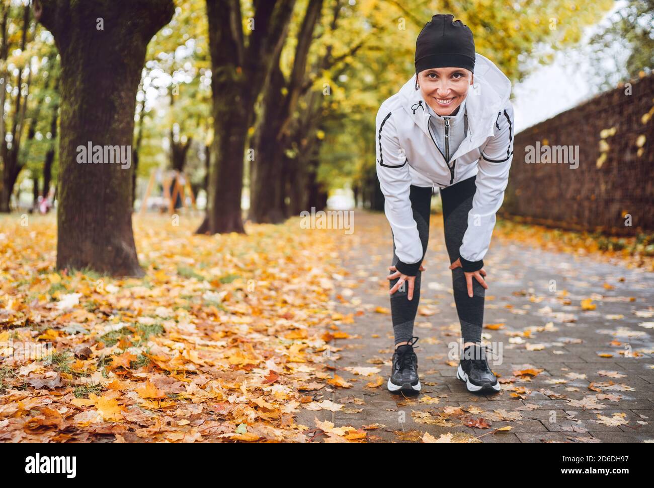 Tired female athlete finish hi-res stock photography and images - Alamy