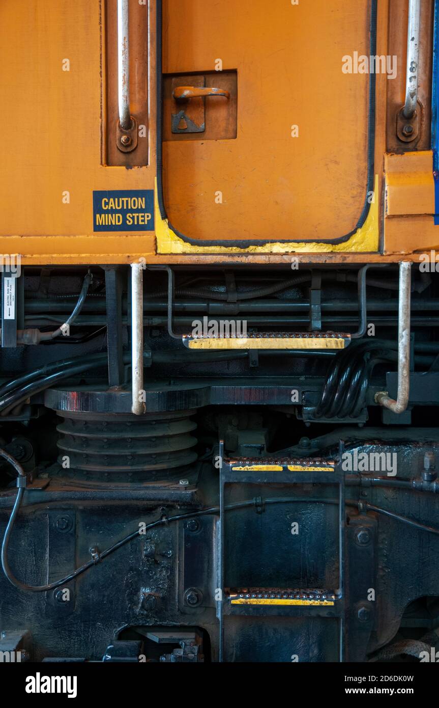 "Caution Mind Step". Detail of step ladder and door to driver's cabin ...