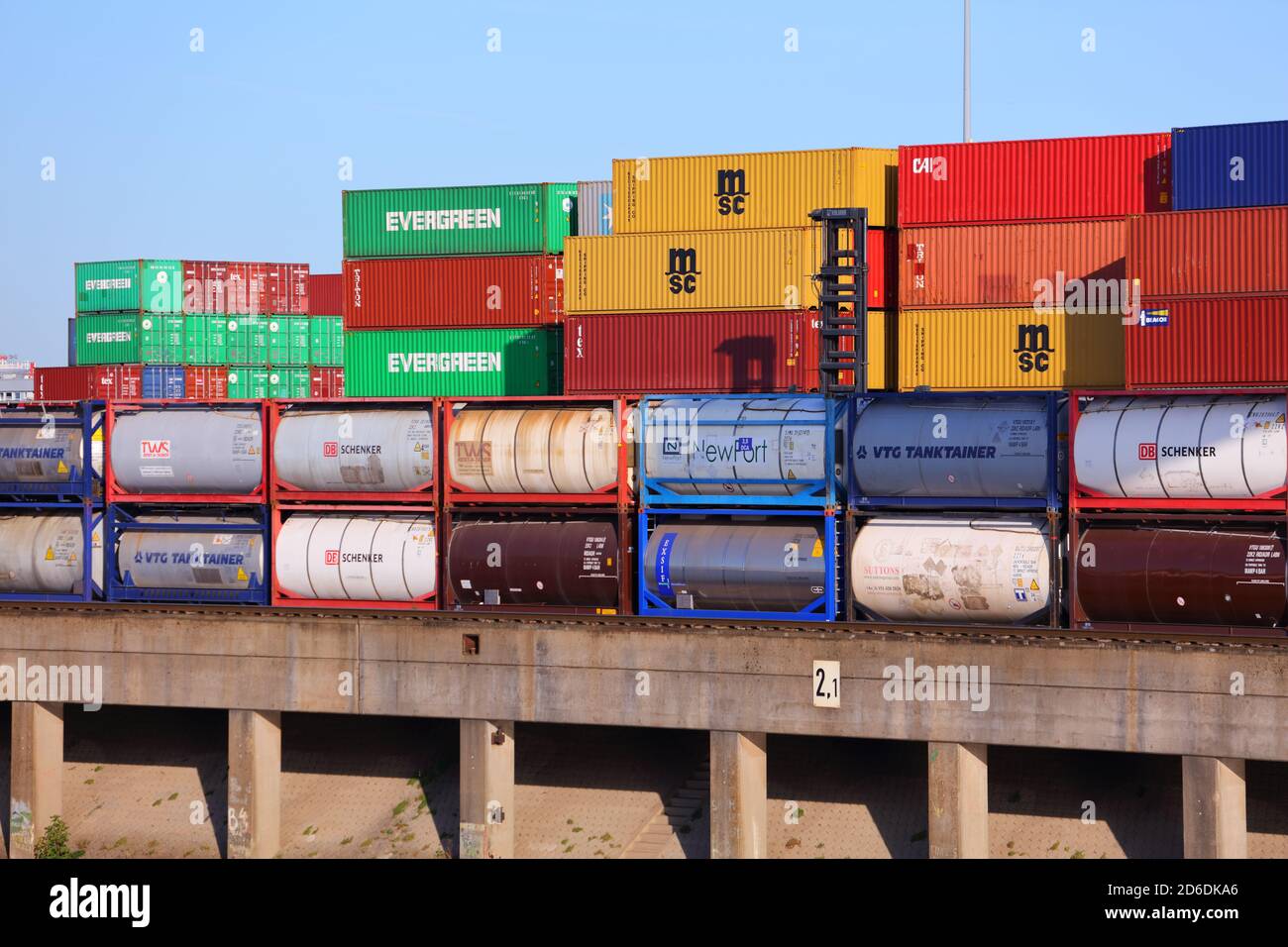 DUISBURG, GERMANY - SEPTEMBER 18, 2020: Shipping containers and tank ...