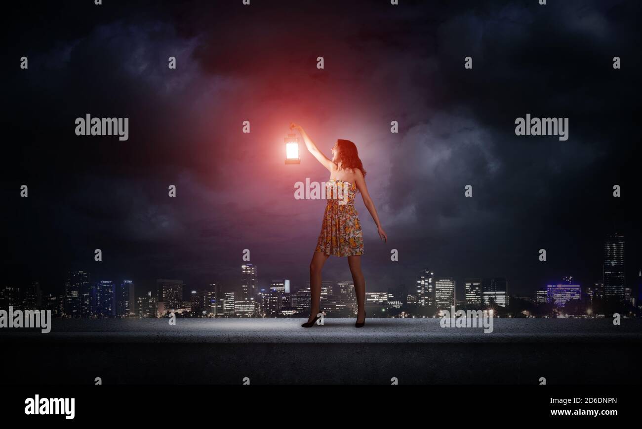 Girl lost in darkness Stock Photo - Alamy