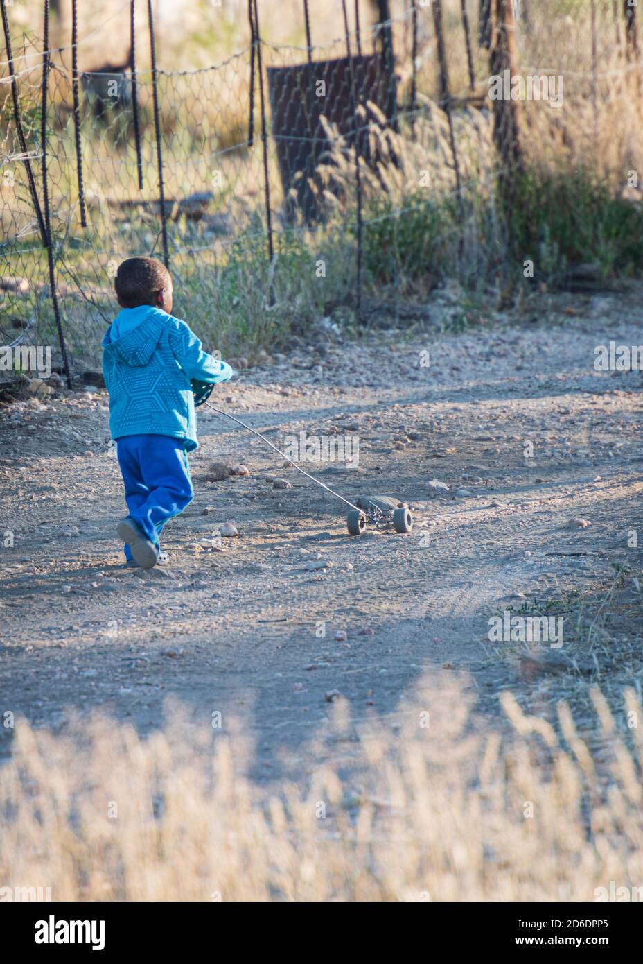 A jeep tour through Namibia, wildlife, country and people. African boy ...