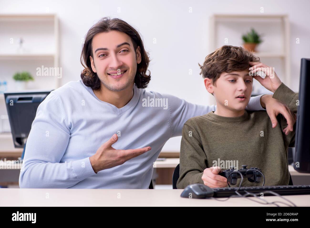Father and son playing the computer games Stock Photo - Alamy