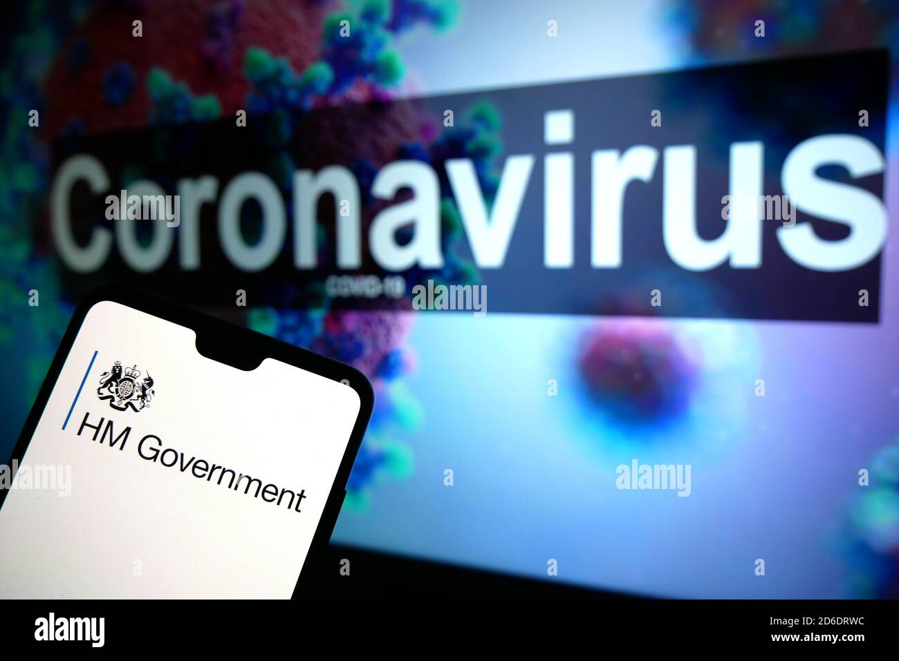 The HM Government logo seen displayed on a mobile phone with an ...