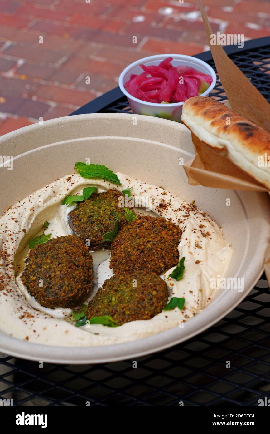 Bowl of falafel and hummus Stock Photo - Alamy