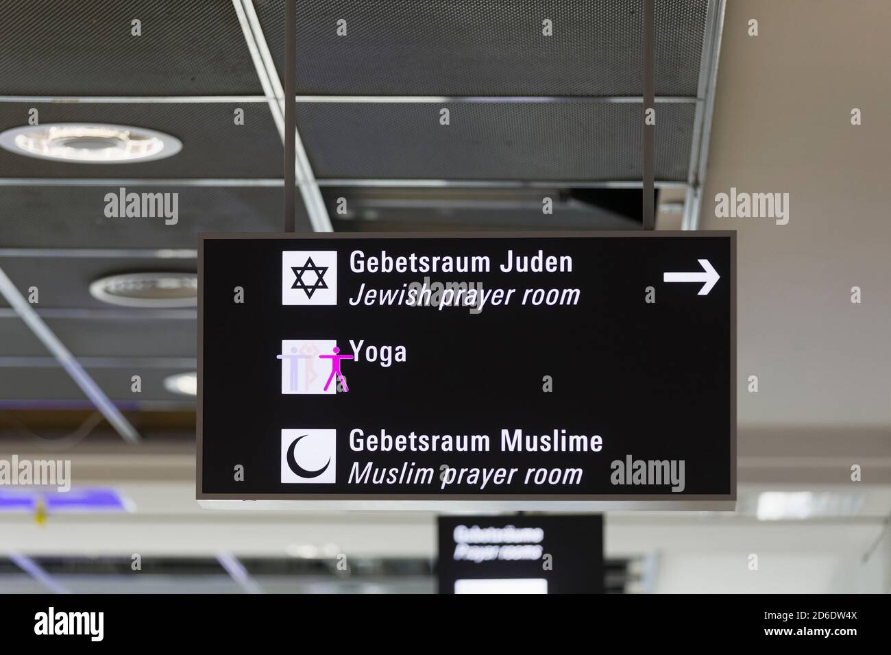 Sign to different prayer rooms Stock Photo - Alamy